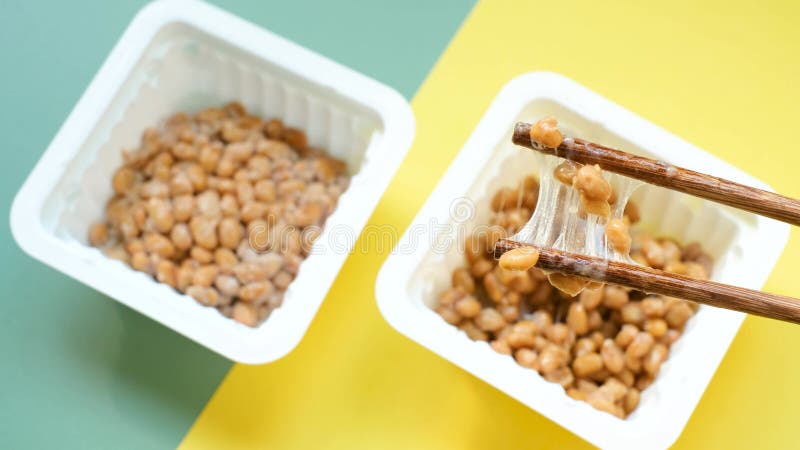 Two Plastic Boxes with Natto Beans on Green and Yellow Background Top ...