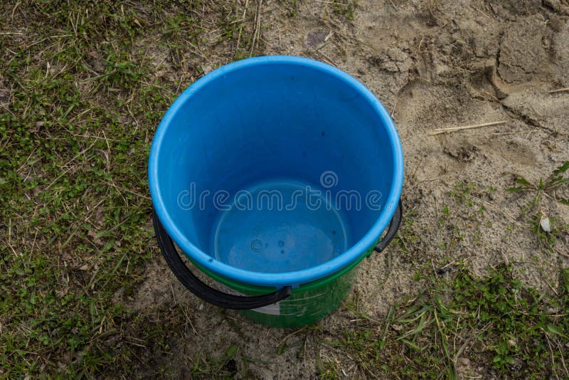 Two Plastic Buckets are on the Ground Stock Image - Image of used, wood ...