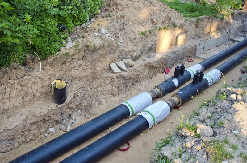 Two Plastic New Heating Tube in Trench Stock Image - Image of line ...