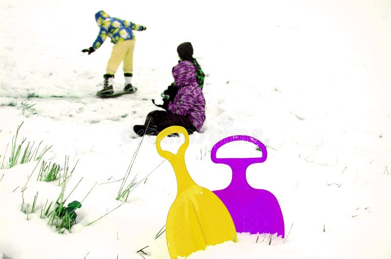 Two plastic sledges stock image. Image of children, play - 215509039