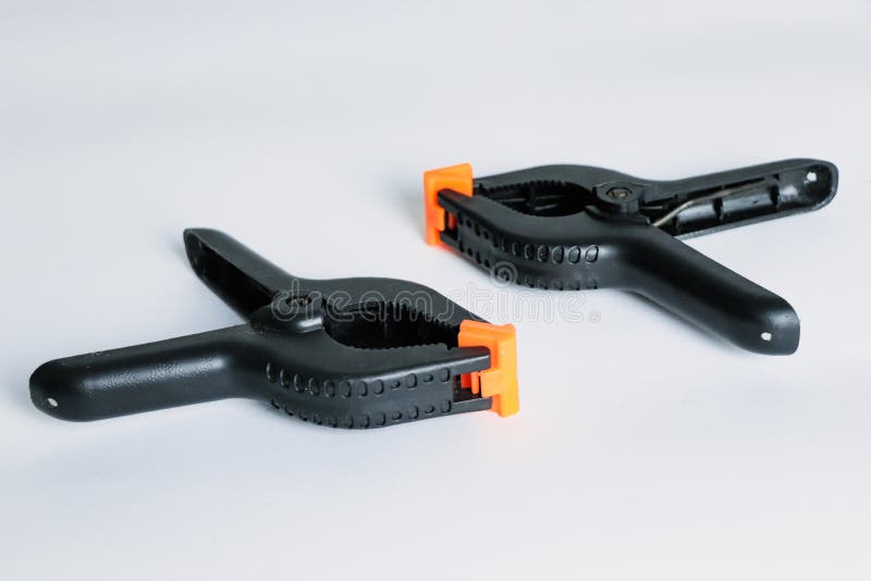 Two Plastic Spring Clamps for Backdrop on White Background Stock Image ...