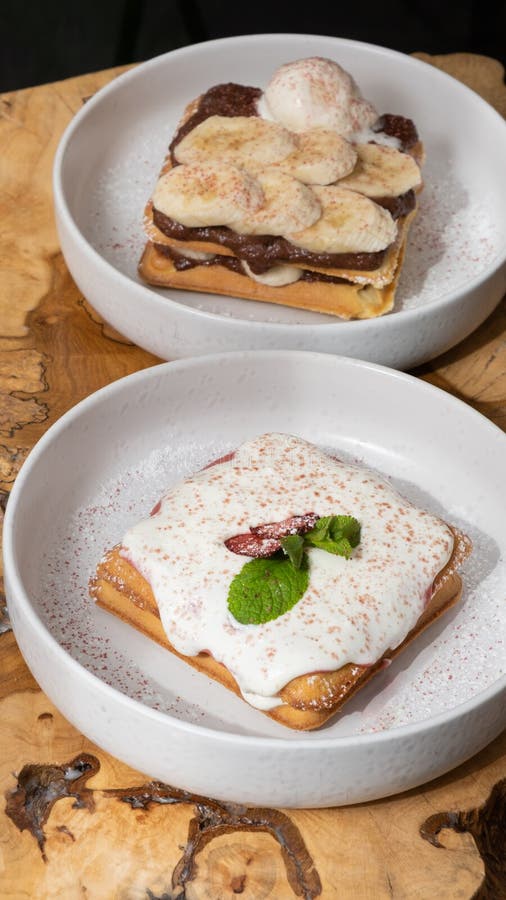 Two Plates of Belgian Waffles on Wooden Cafe Table Angle View Stock ...