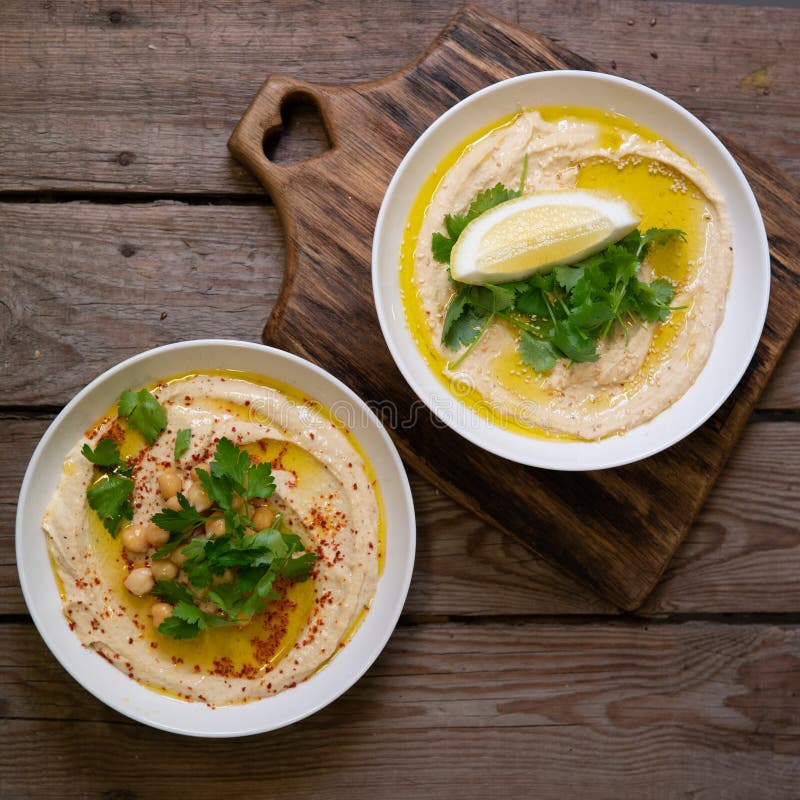 Two plates with humus stock image. Image of healthy - 178570687