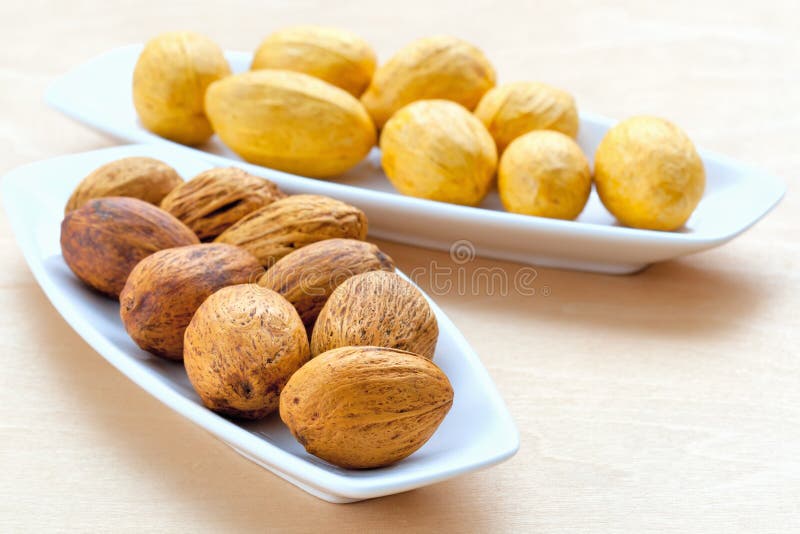 Two plates with large nuts stock image. Image of ingredient - 29044507
