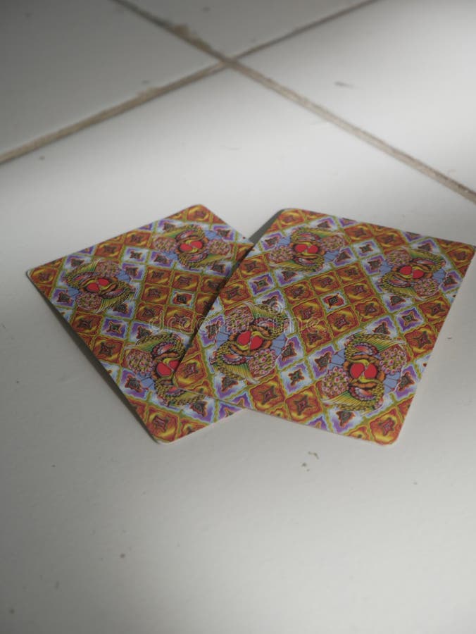 Two Playing Cards on the White Floor. Stock Image - Image of symmetry ...