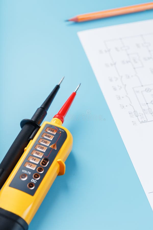 Two-pole Voltage Indicator with Electrical Drawings on a Blue ...