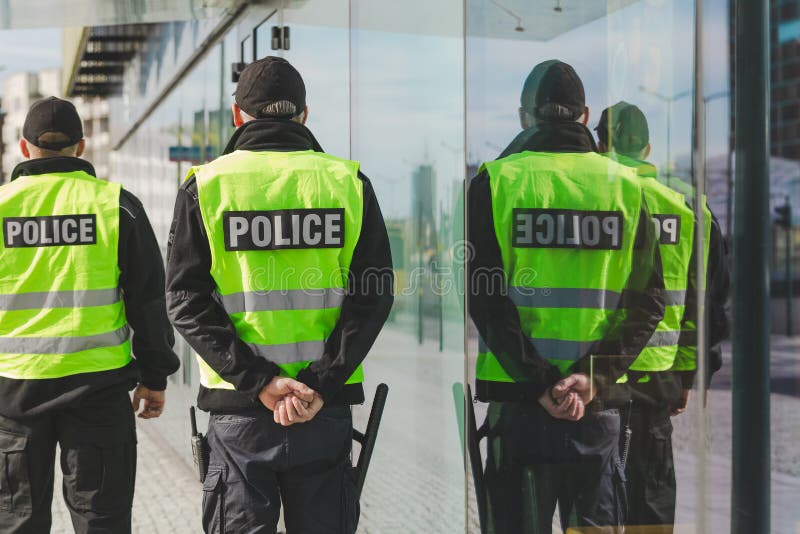 Two police officers stock image. Image of suspects, detective - 205908703