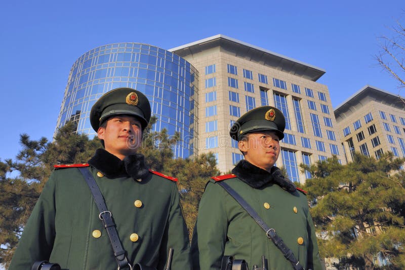 Two policemen stand guard editorial stock photo. Image of police - 22279258