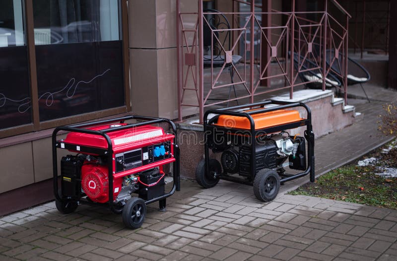 Two Portable Generators Placed Outside a Building, Showcasing Power ...