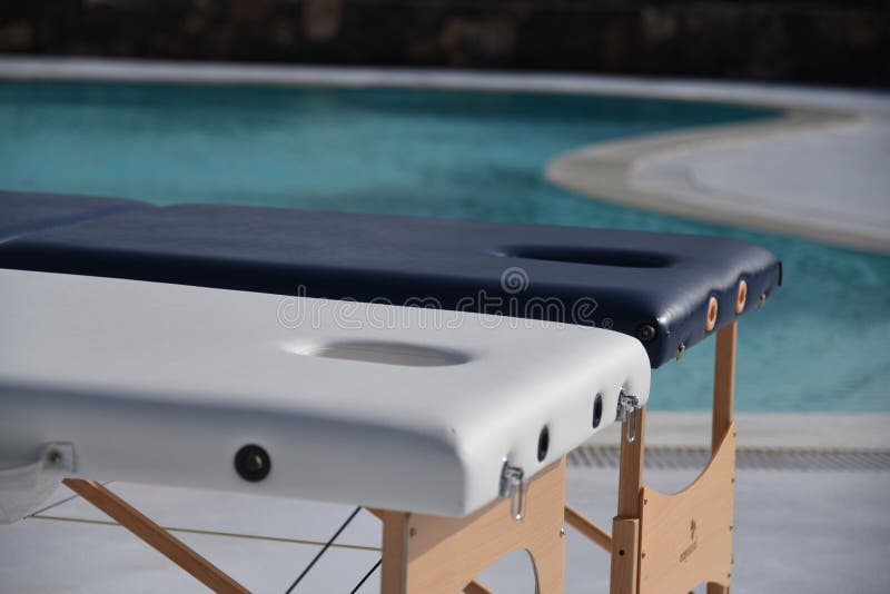 Portable Massage Tables on the Poolside Stock Image - Image of tables ...