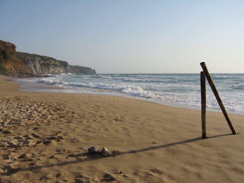 Two Posts on an Empty Beach Stock Photo - Image of pair, surf: 635840