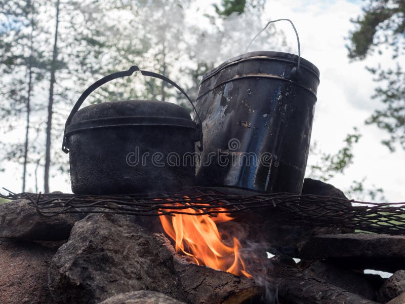 Pots Over a Fire in a Stone Hearth Stock Photo - Image of wood, black ...