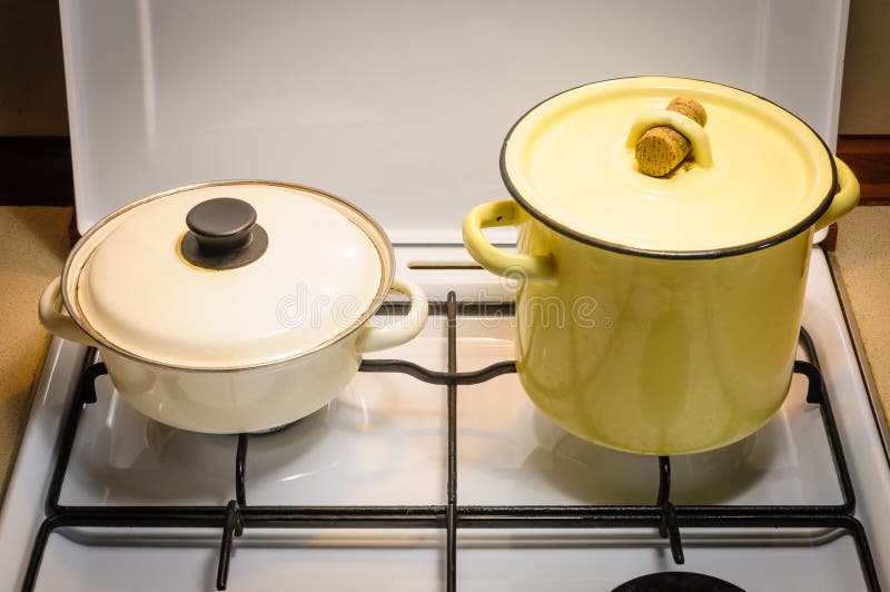 Two Pots on the Stove stock photo. Image of stove, yellow - 97038804