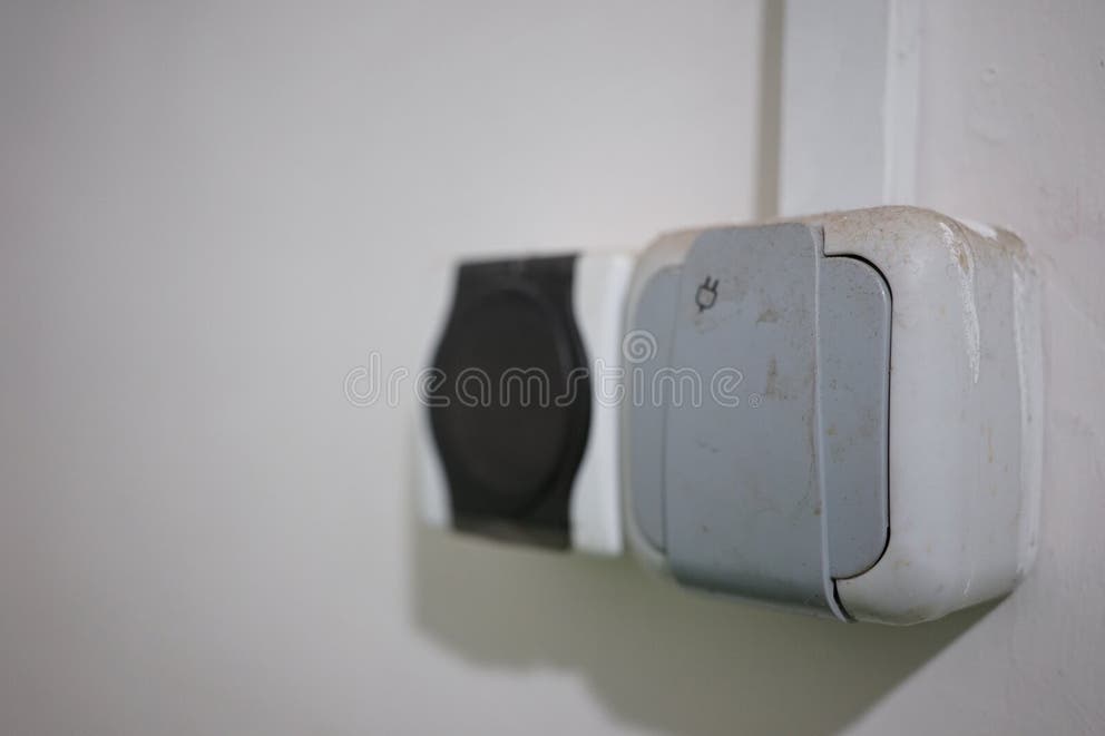 Wall-mounted Power Outlets in an Indoor Setting with Neutral Colors ...