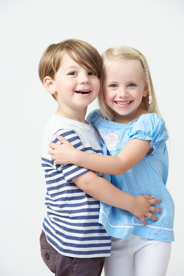 Two Pre School Pupils Hugging One Another Stock Photo - Image of child ...