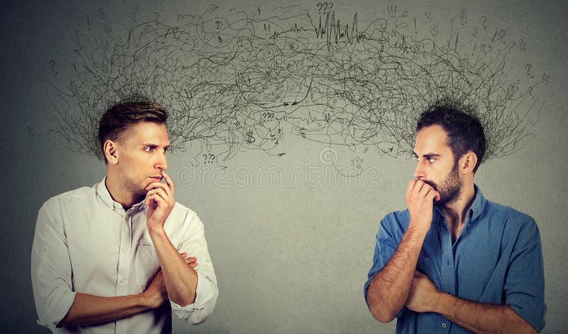 Profile of Two Preoccupied Businessmen Looking at Each Other Stock ...