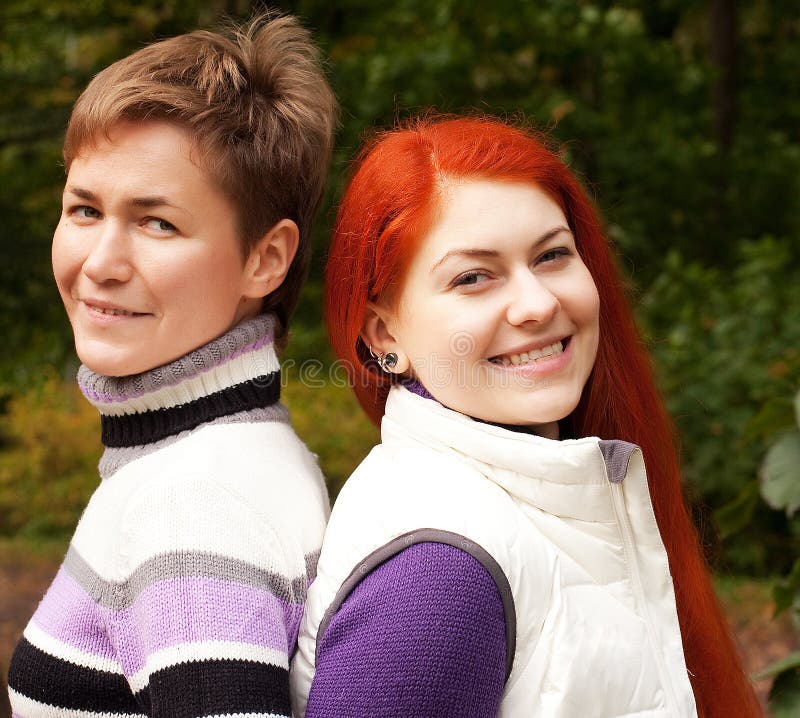 Two Pretty Girls in Autumn Park Stock Photo - Image of girls, gorgeous ...