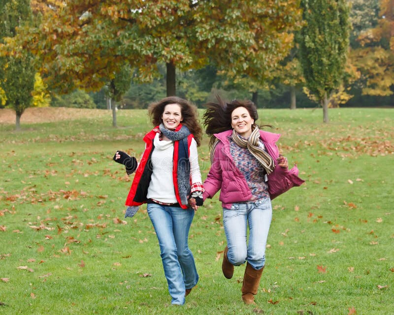 Two Pretty Girls Having Fun Stock Photo - Image of friendship, outdoors ...