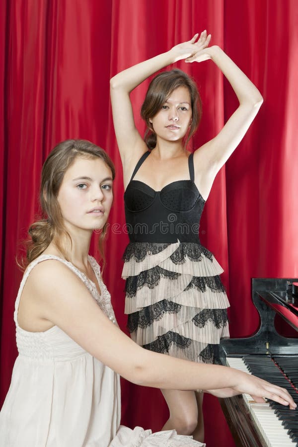 Two Pretty Girls Performing on Stage Stock Photo - Image of entertain ...