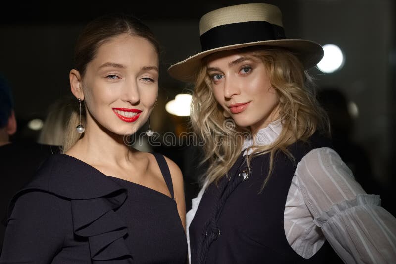 Two Pretty Models Posing To Camera at Backstage of Fashion Week Stock ...