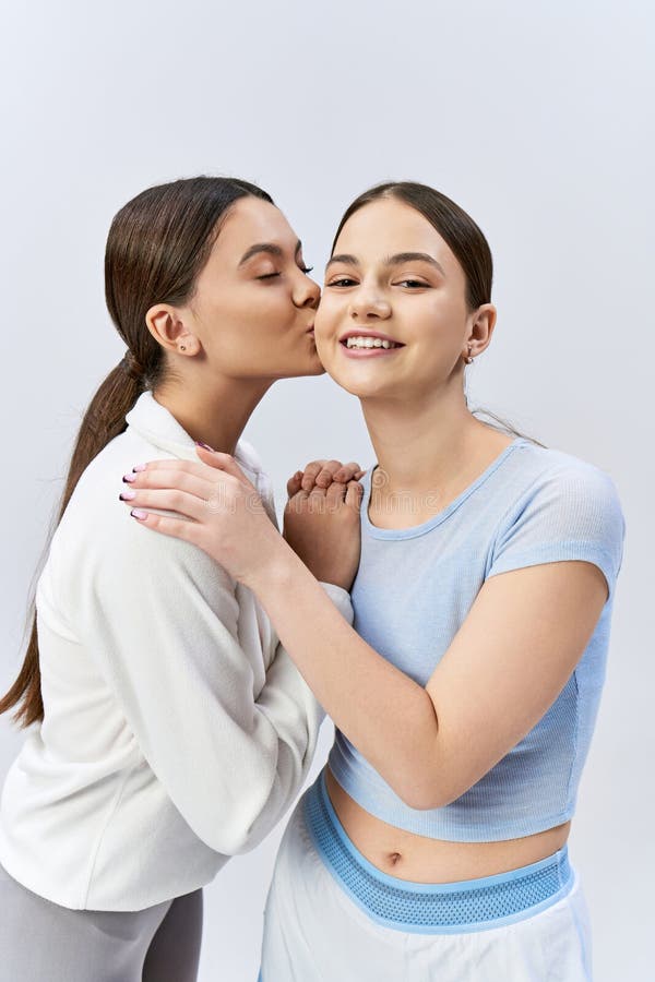 Two Pretty Teenage Girls, One in Stock Photo - Image of studio, bond ... Two Pretty Teenage Girls, One in Stock Photo - Image of studio, bond ...