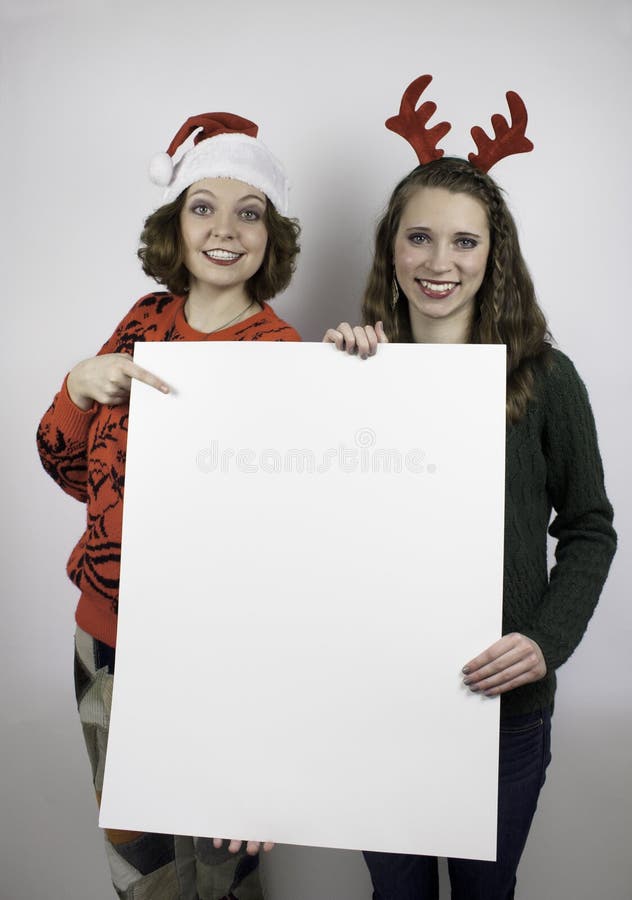 Two Pretty Woman Holding Signs Stock Image - Image of caucasian, person ...