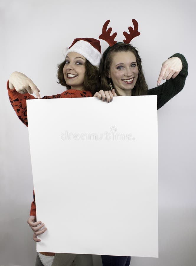 Two Pretty Women Holding Sign for Copy Space Stock Photo - Image of ...