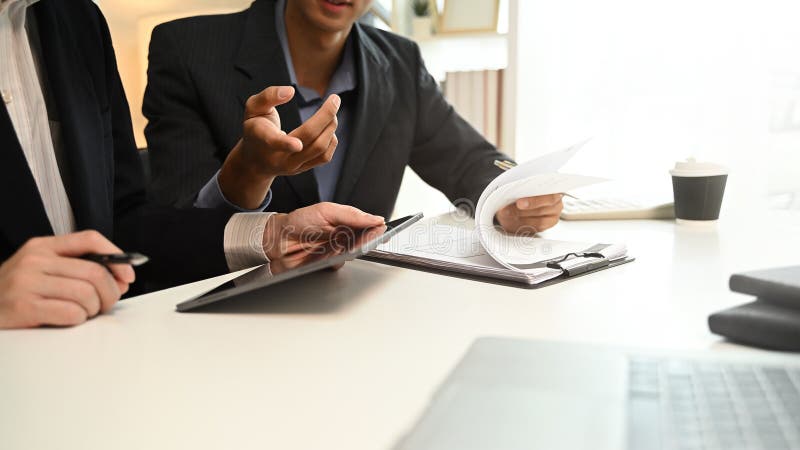 Two Professional Businessman in Formal Suit Using Digital Tablet and ...