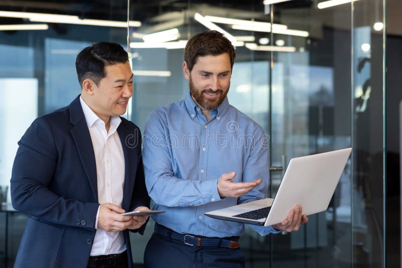 Upset Asian Male Businessman Sitting in the Office at the Table ...