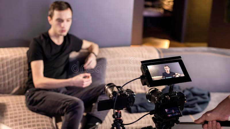 Two Professional Camera Capturing a Talking Man at Home Stock Image ...