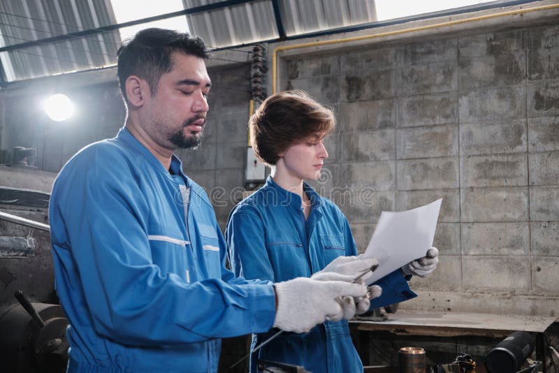 Professional Workers Teams Work in the Metalwork Manufacturing Factory ...