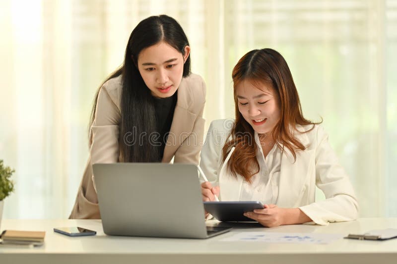 Two Professional Partners Discussing Business Plan, Collaborating on ...