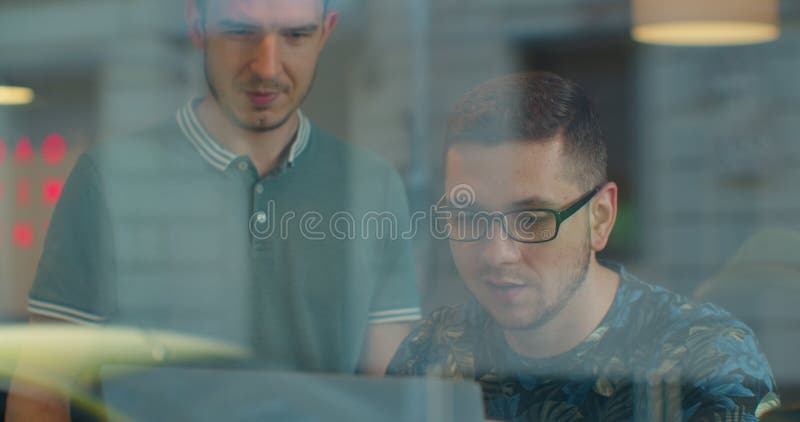 Two Professional it Programers Discussing Technical Data Show on ...