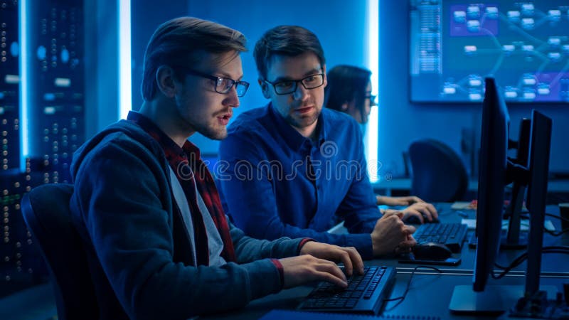 Two Professional it Programers Discussing Technical Data Show on ...