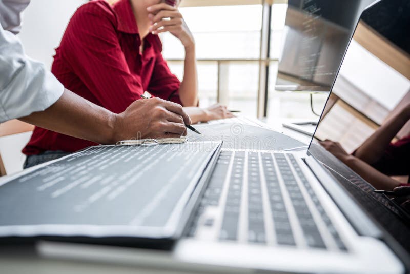 Two Professional Programmer Cooperating And Working On Web Site Project In A Software Developing