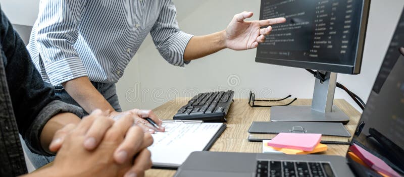 Two Professional Programmer Cooperating and Working on Web Site Project ...