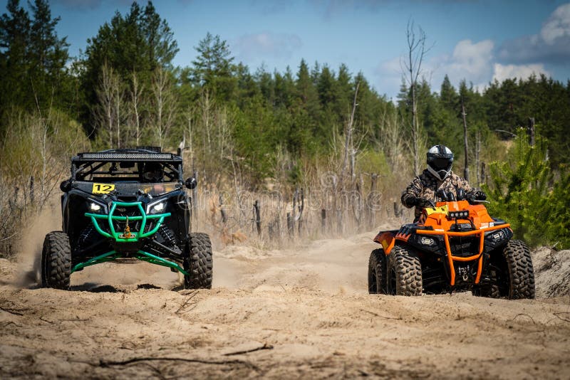 Two Professional Quad Ride Fast on Sand. Quad Racing, ATV 4x4 Stock ...