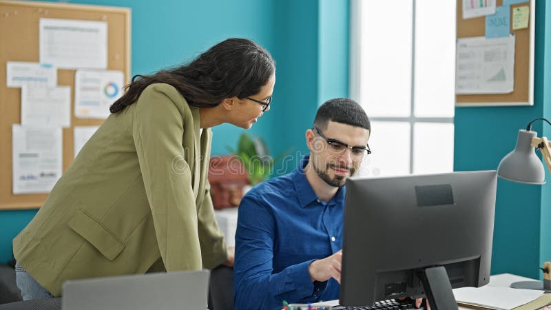 Two Professional Workers, a Man and Woman, Blending Technology and ...
