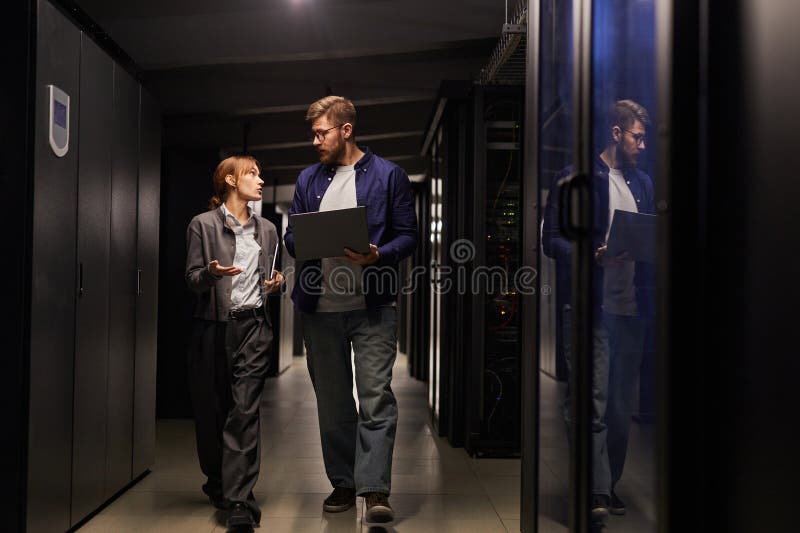 It Technicians Discussing Network Strategy in Server Room Stock Image ...