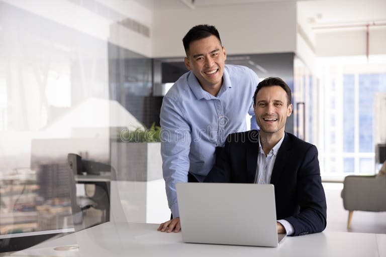Two Projects Managers Posing in Modern Workplace with Laptop Stock ...