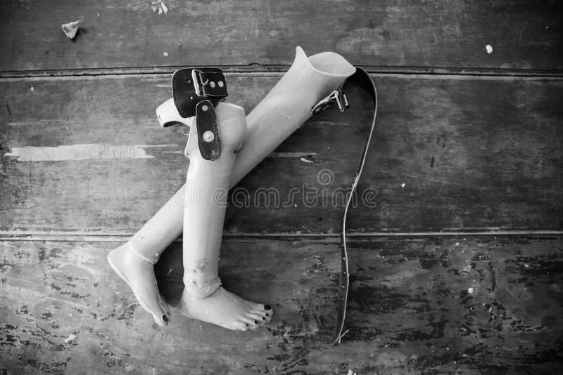 Two Prosthetic Legs On Wooden Surface Picture. Image: 109914046