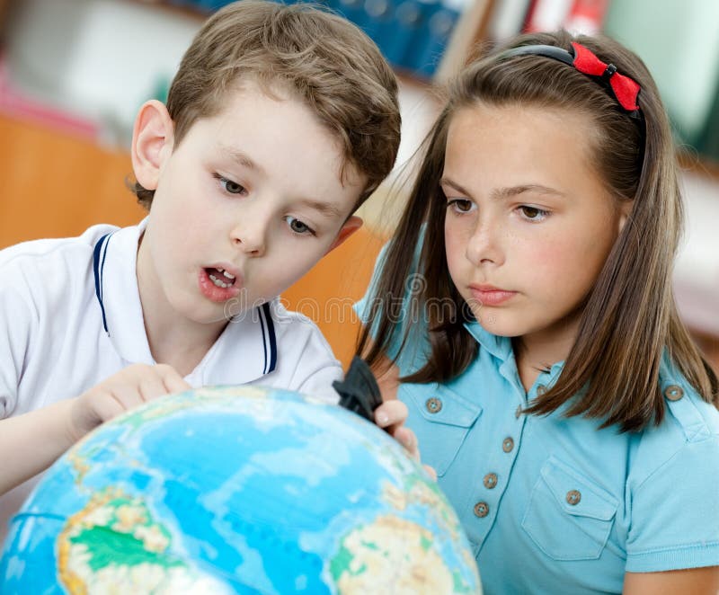 Studying Geography with Terrestrial Globe Stock Image - Image of girl ...