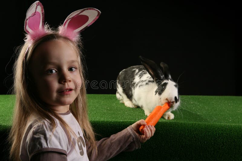 Two rabbits 3 stock image. Image of child, turf, animal - 4285543