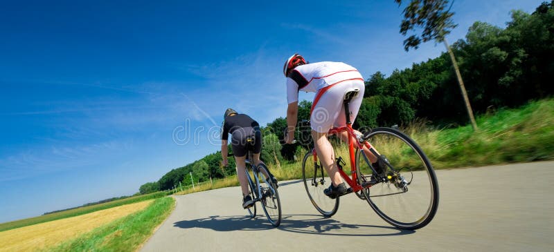 Two Racing Cyclists stock image. Image of athlete, chasing - 95661035