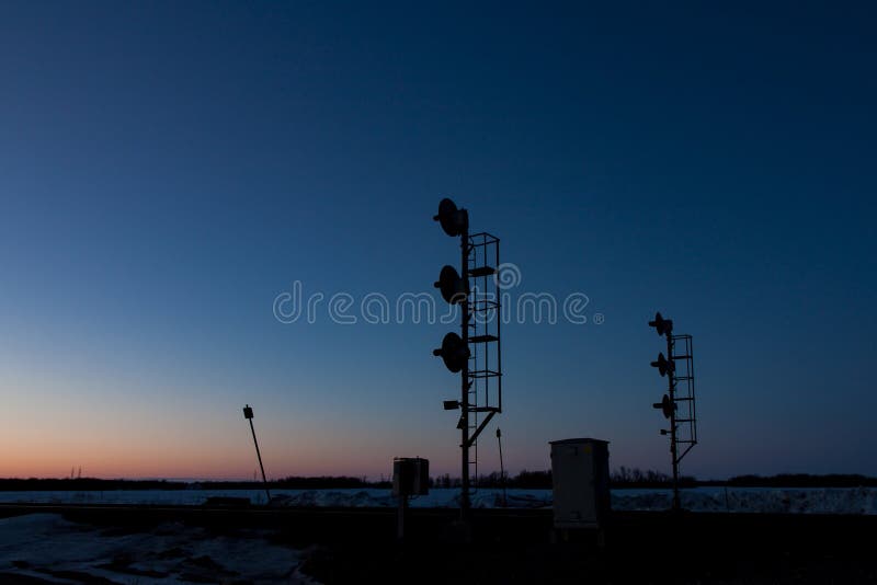 Two Railway Signal Silhouettes at Sunset Stock Image - Image of sunset ...