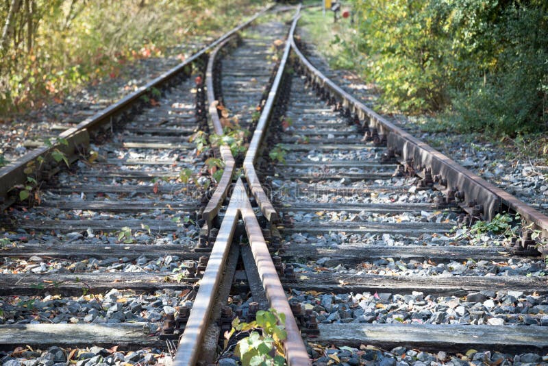 Two Railway Tracks Come Together with Railroad Switch Stock Photo ...