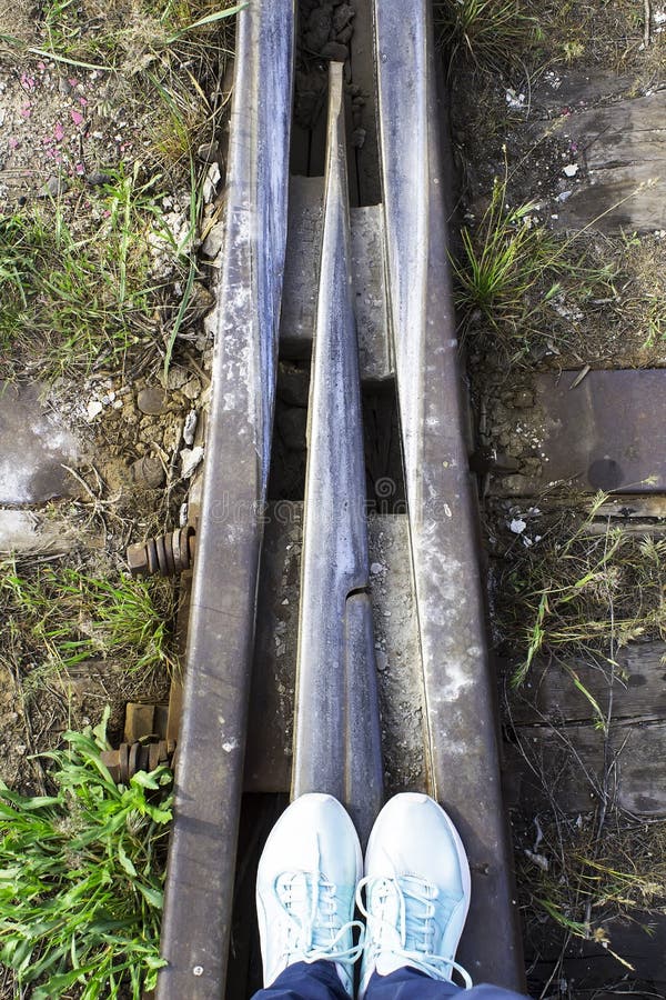 Two Railway Tracks Merge Together Stock Photo - Image of carriage, hand ...