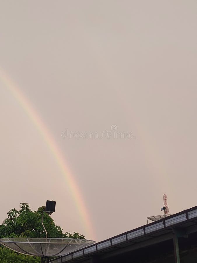 Two Rainbows,the First Rainbow that is almost Invisible. Even Though it ...
