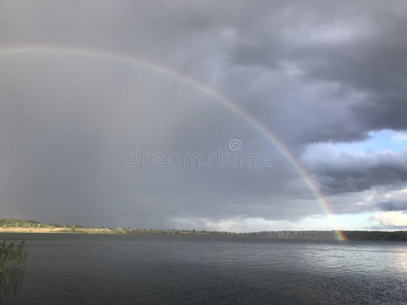 Two Rainbows Over the Lake, Thunderclouds Stock Photo - Image of storm ...