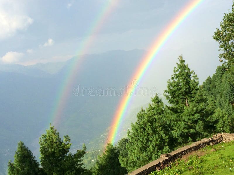 Two Rainbows stock photo. Image of rainbows, beautiful - 43873998